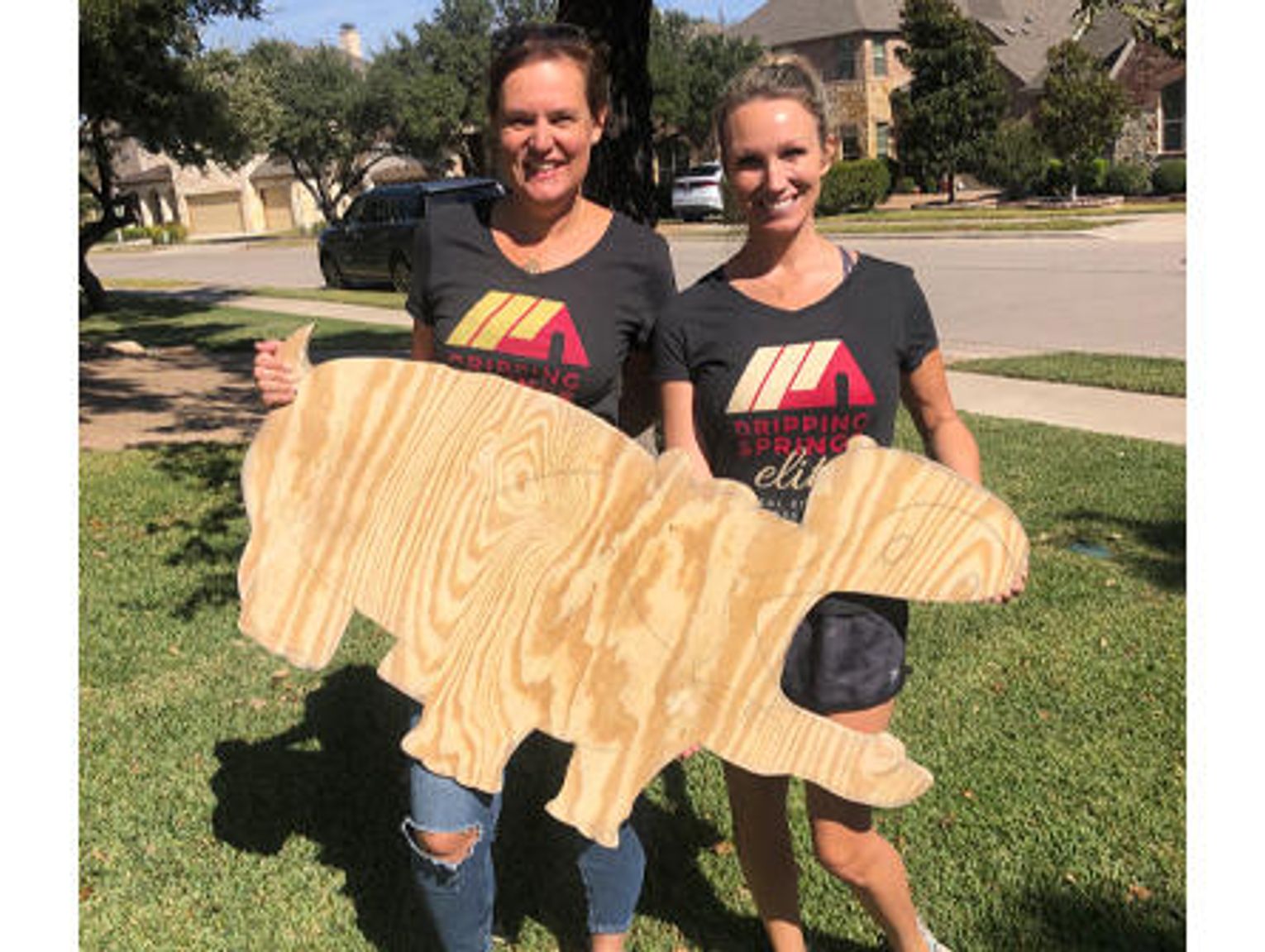 Dripping Spring real estate pros Go Wild for Red Arena