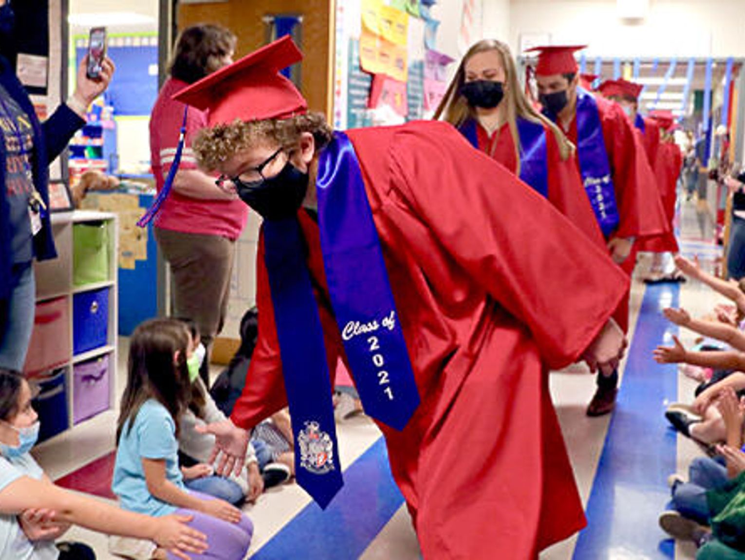Grad Walk tradition continues at Hays CISD